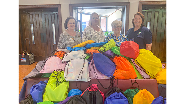 GFWC members take part in GFWC service project as part of workshop ...