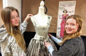 Newspaper dresses create walk through fashion history - Franklin County ...
